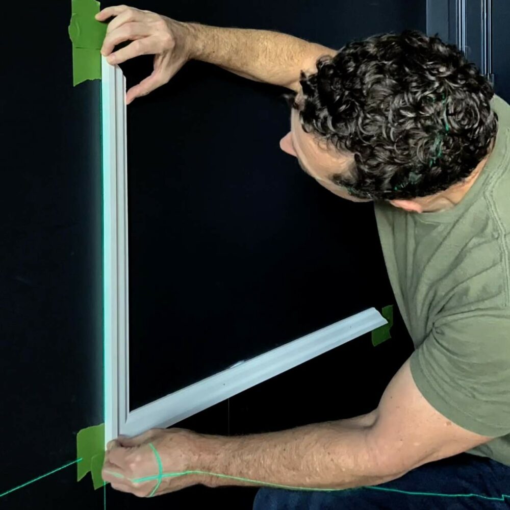 How to Install Picture Frame Moulding on a Wall - Plank and Pillow